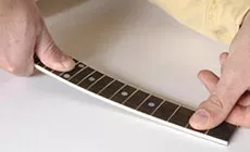 Binding and fretting a Red Diamond mandolin fingerboard - StewMac