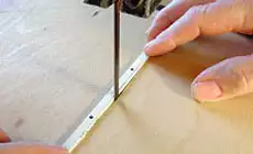 Installing side dots with the help of plywood scraps - StewMac