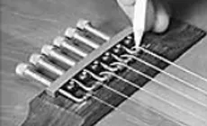 Correct saddle intonation with The Intonator - StewMac