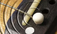 Custom-fit your bridge pins for better sound - StewMac