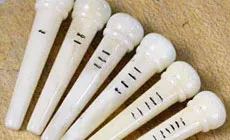 Custom-fit your bridge pins for better sound - StewMac