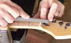 Fine tuning a bolt-on replacement neck - StewMac