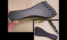 For ebony streaks, use black fingerboard stain - StewMac