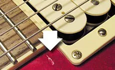 Lacquer drop fill: hiding a scratch on a customer's Les Paul - StewMac