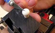 Making new bridge pins look old on a vintage Gibson - StewMac