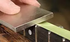 Using fret polishing wheels on a flex shaft - StewMac