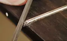 Using fret polishing wheels on a flex shaft - StewMac