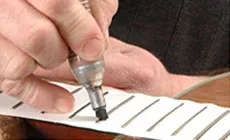 Using fret polishing wheels on a flex shaft - StewMac