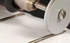 Using fret polishing wheels on a flex shaft - StewMac