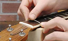 How to hammer frets - StewMac