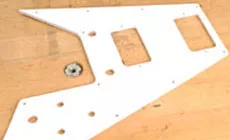 Custom-shaping a replacement pickguard for a 1990s Gibson - StewMac