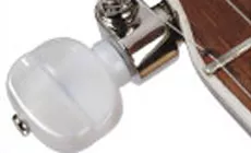 Setting up a banjo's 5th string: nut, capos and peg - StewMac