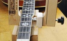 Setting up a banjo's 5th string: nut, capos and peg - StewMac