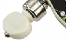 Setting up a banjo's 5th string: nut, capos and peg - StewMac