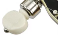 Setting up a banjo's 5th string: nut, capos and peg - StewMac