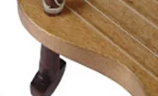 Setting up a banjo's 5th string: nut, capos and peg - StewMac