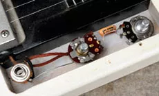Fixing dirty, scratchy control pots on a Supro lap steel - StewMac