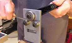 When frets don't fit the slot, resize the fret tang - StewMac