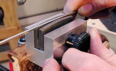 When frets don't fit the slot, resize the fret tang - StewMac