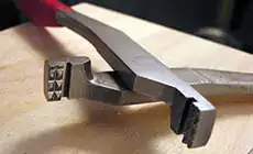 When frets don't fit the slot, resize the fret tang - StewMac